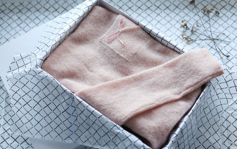 Pink Cashmere Cardigan in a Box, Fabric Textile Background. Gift Stock ...
