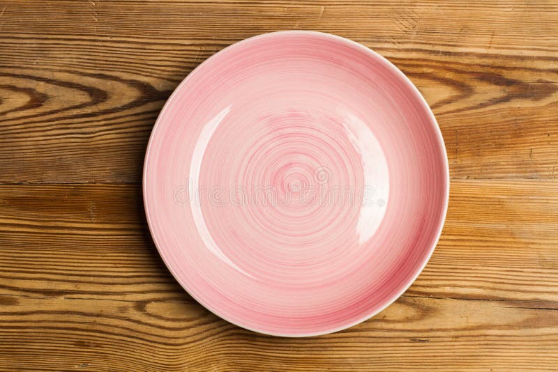 A pink ceramic plate stock photo. Image of clean, plate - 146215348