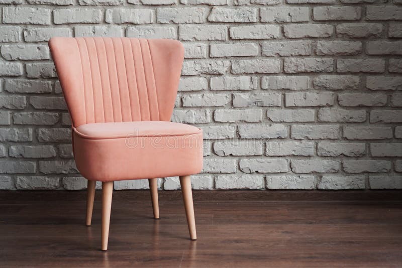 Pink Chair on a White Brick Wall Background Stock Photo - Image of ...