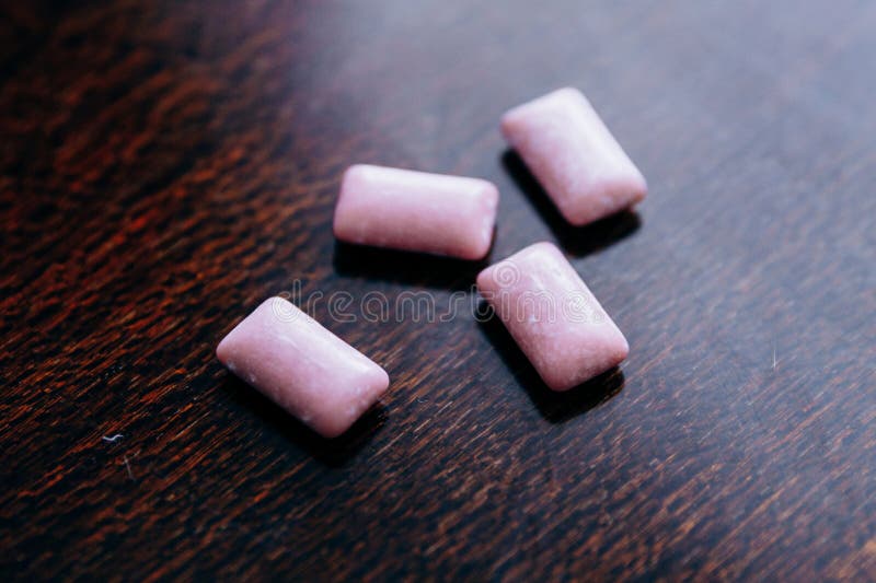 Pink Chewing Gum Lies on the Table Stock Photo - Image of color, adult ...