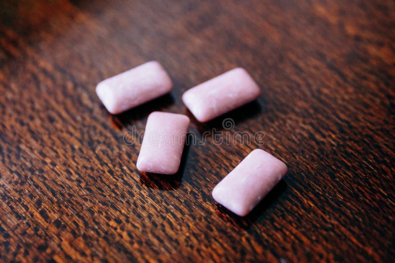 Pink Chewing Gum Lies on the Table Stock Photo - Image of cute, female ...