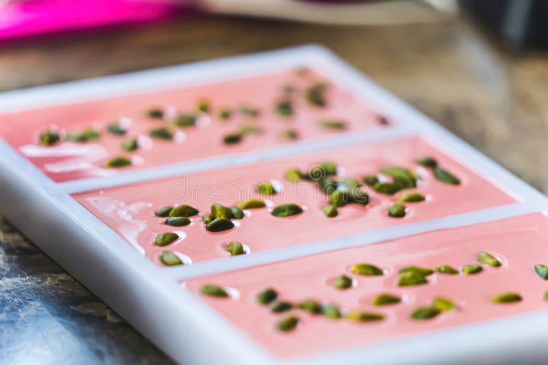 Pink Chocolate Bars in Moulds. Ruby Chocolate Production Process ...