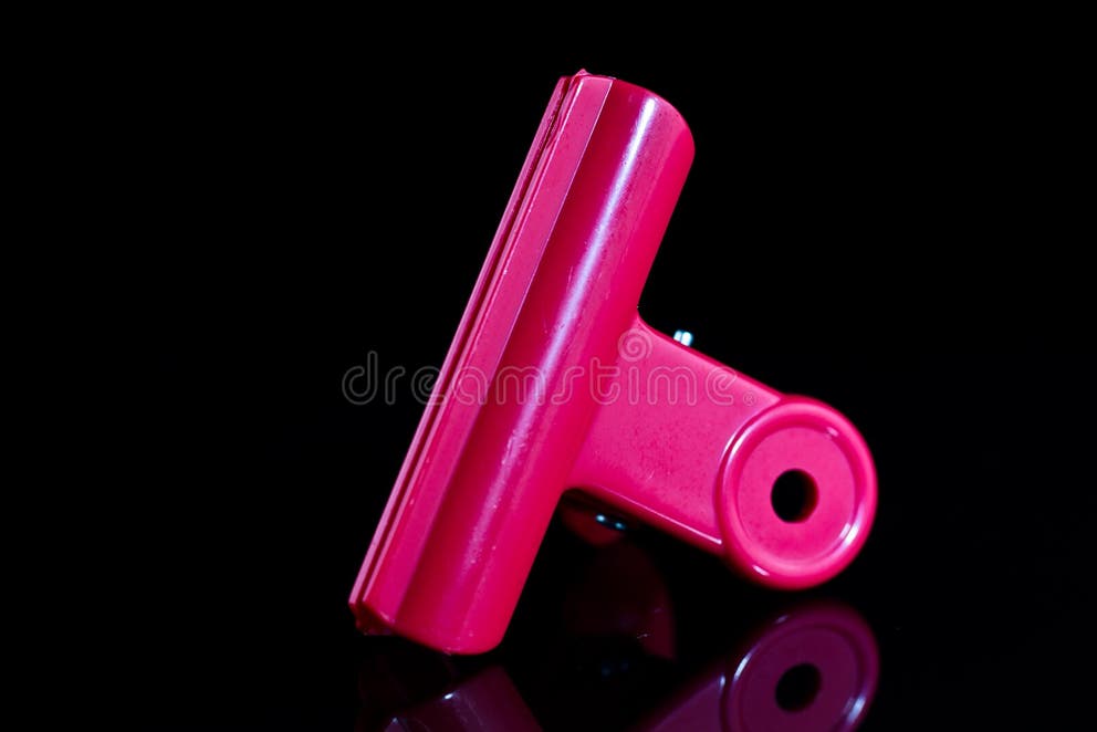 Pink Clamp and Mirror Image II Stock Photo - Image of background ...
