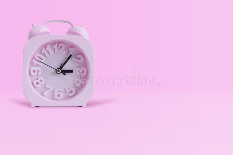 Pink Clock Isolated on Pastel Pink Background Stock Image - Image of ...