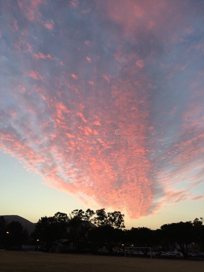 Pink Clouds As the Sun Sets Stock Image - Image of sets, sunset: 55549625
