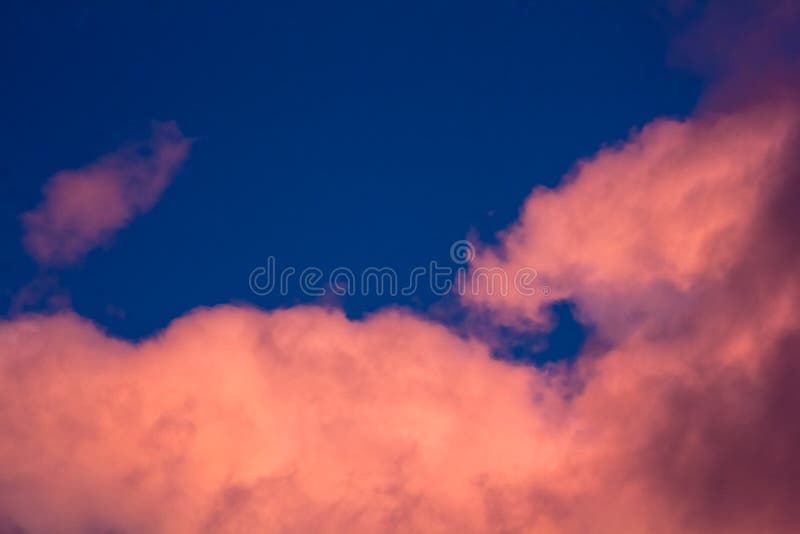 Pink Clouds on a Background of Blue Sky at Sunset Stock Photo - Image ...