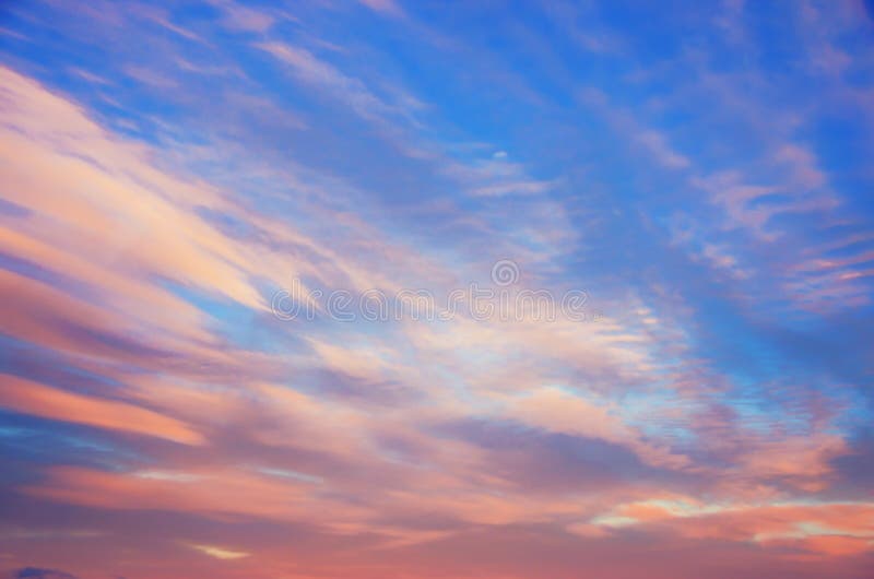 Pink Clouds are Floating on a Bright Blue Sky. Stock Image - Image of ...