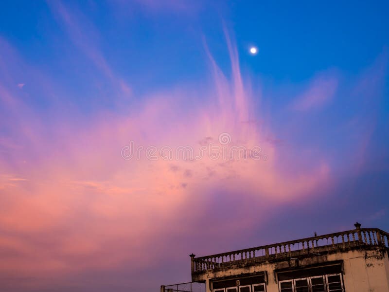 Pink Clouds and Moon in Sunset Sky Stock Image - Image of fluffy ...