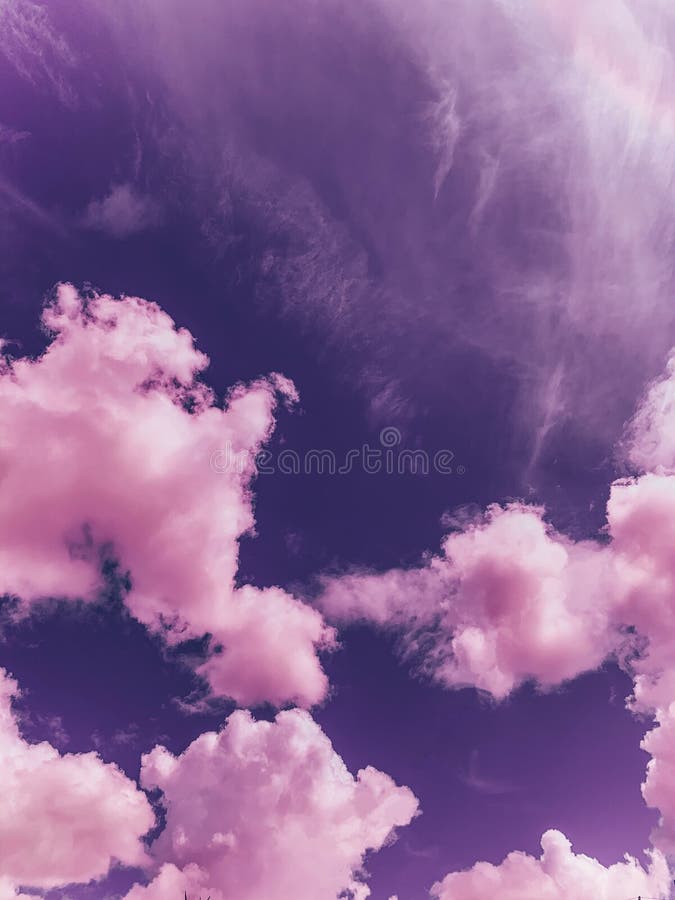 Pink clouds and violet sky stock image. Image of atmosphere - 152731683