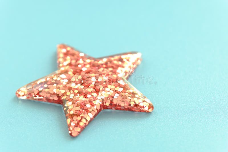 Pink Color Christmas Star Isolated on Blue Background Stock Photo ...