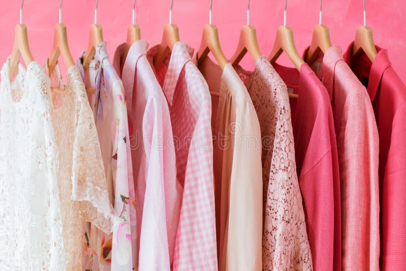 Pink colored women clothes stock photo. Image of hanger - 136943896