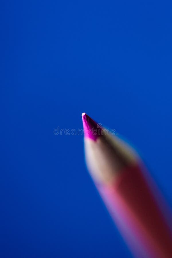 Pink Colouring Crayon Pencil Isolated on Blue Background Stock Image ...