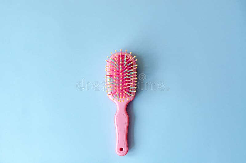 Pink Comb for Hair on a Blue and Pink Background Stock Image - Image of ...