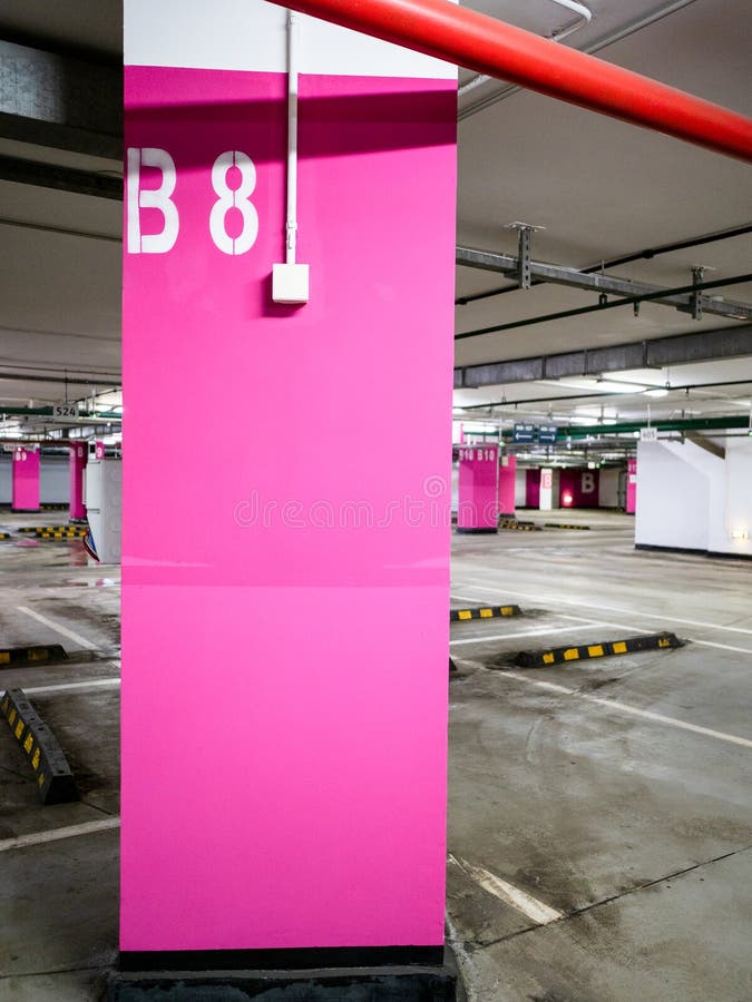 Pink Concrete Post in Underground Parking Area Stock Image - Image of ...