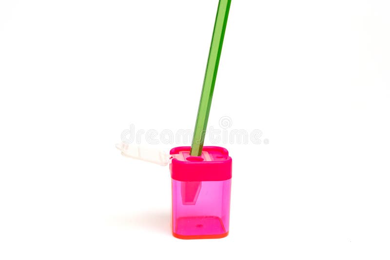 A Pink Container with a Green Pencil Sticking Out of it Stock Photo ...