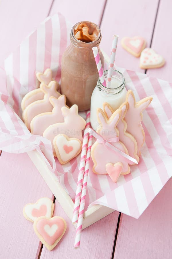 Pink cookies and milk stock photo. Image of treats, dessert - 66034828