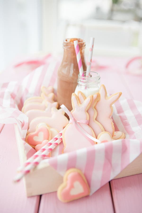 Pink cookies and milk stock photo. Image of treats, dessert - 66034828