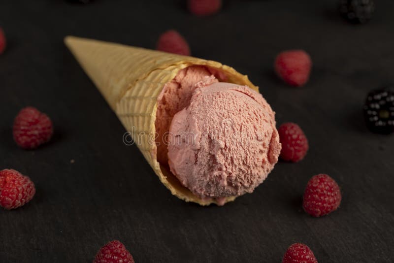 Pink Creamy Raspberry Flavored Ice Cream with Red Raspberry Berries ...