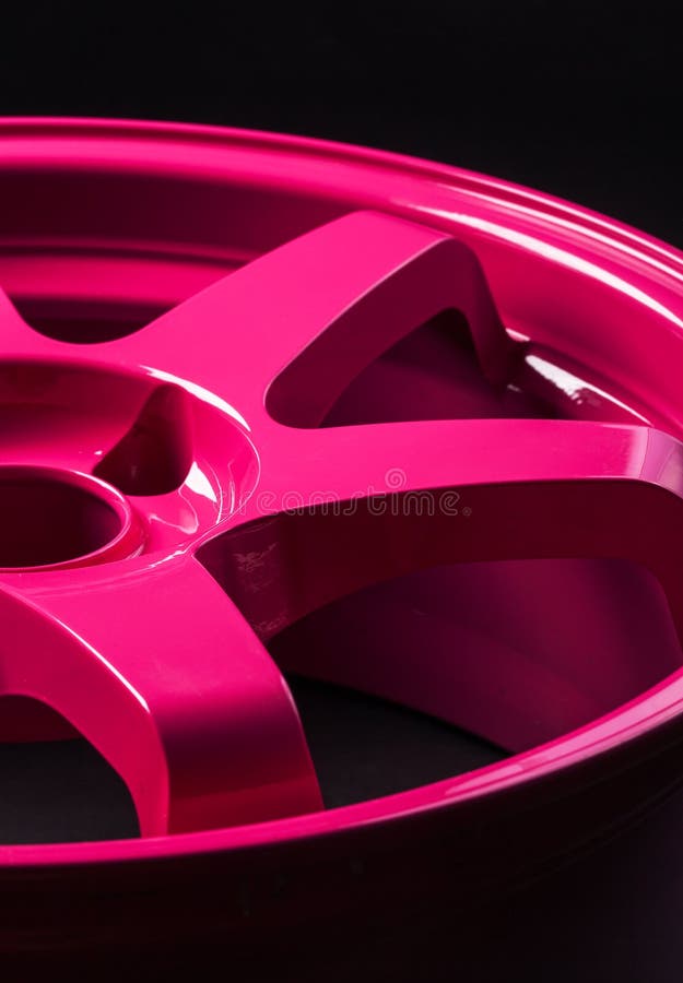 Pink Discs Lie on an Black Background Stock Photo - Image of steel ...