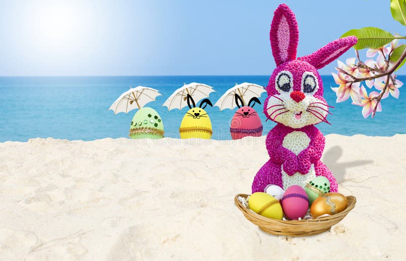 Pink Easter Bunny and Easter Egg with White Umbrella on Tropical Beach ...