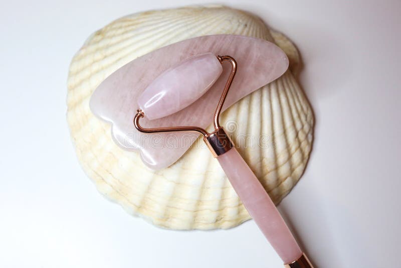Pink Face Roller Laying on White Background. Beauty Roller Tools. Stock ...
