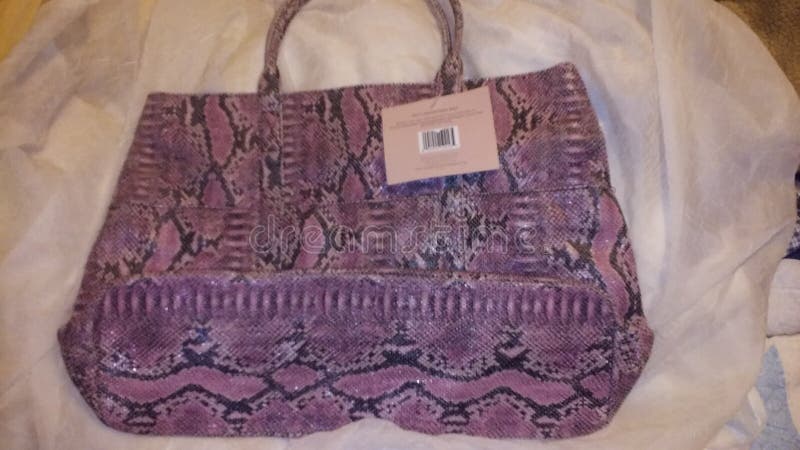 Pink faux snakeskin bag stock image. Image of pink, black - 86305555