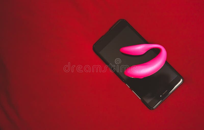 Pink G-spot Vibrator with Phone Stock Photo - Image of play ...