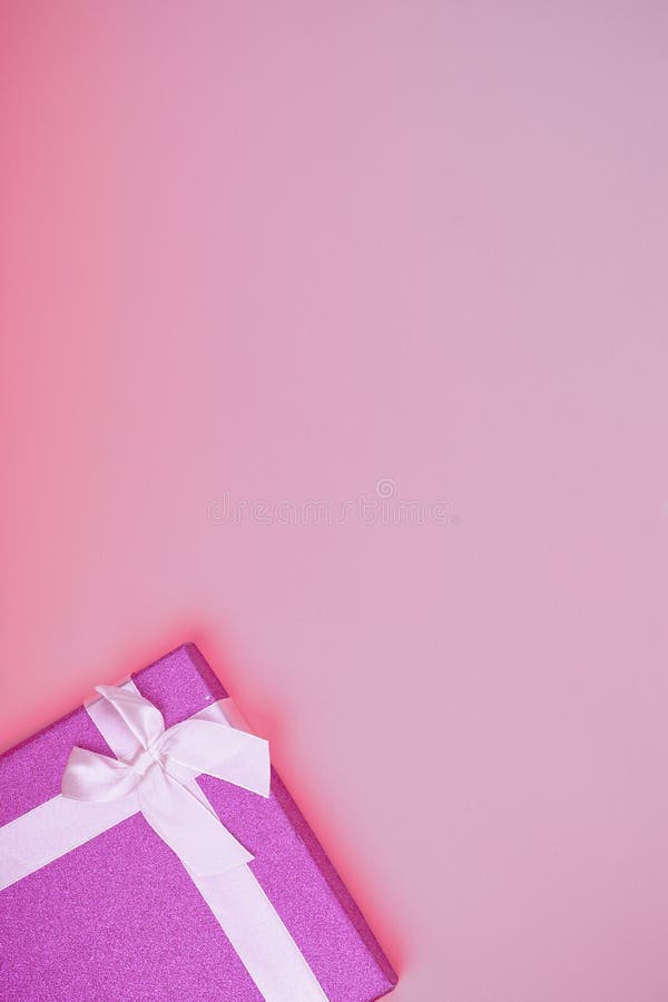Pink Glitter Gift Box with Ribbon on a Pink Background. Minimalistic ...