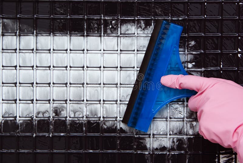 A pink-gloved hand stock photo. Image of clears, scraper - 91388530