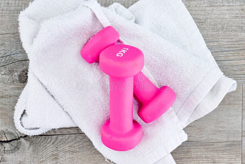 Pink Gym Dumbbell stock photo. Image of active, healthy - 81963212