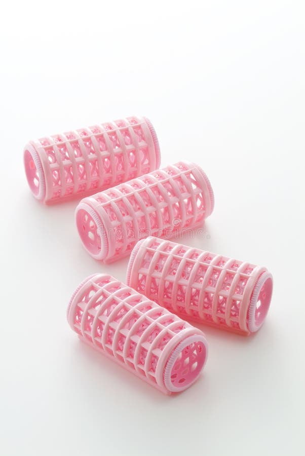 Pink plastic hair curler stock image. Image of hairdressing - 34999401