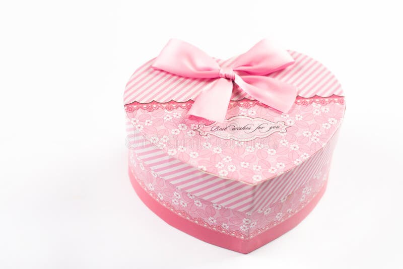 Pink Heart Box with Bow Above Colorful Round Candies Stock Image ...