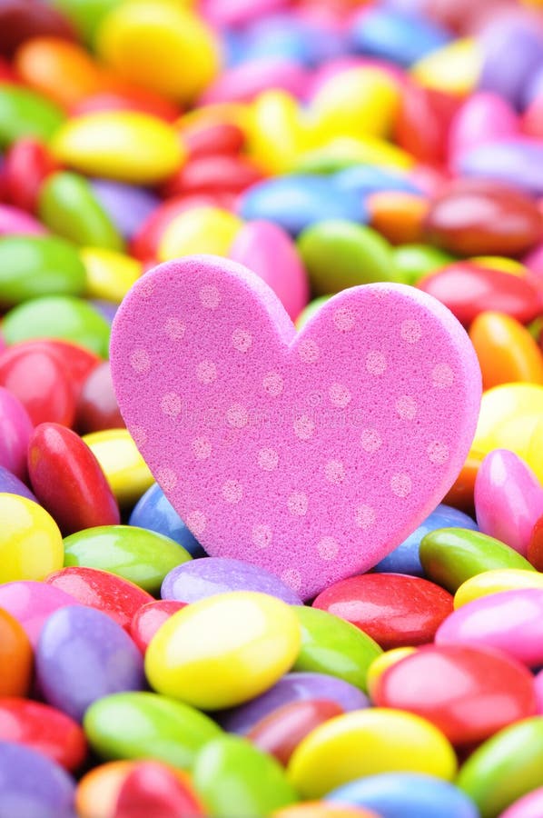 Pink Heart and Colorful Chocolate Smarties Stock Photo - Image of ...