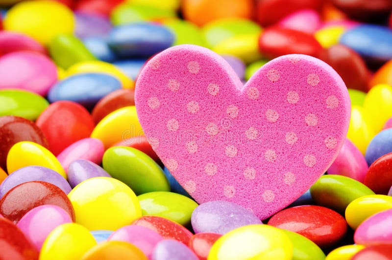 Pink Heart and Colorful Smarties Stock Image - Image of multicolored ...