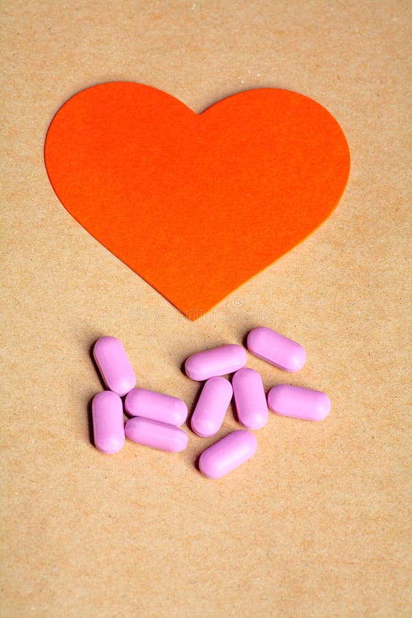Pink Heart Pills. stock photo. Image of heart, pill, medicinal - 62065682