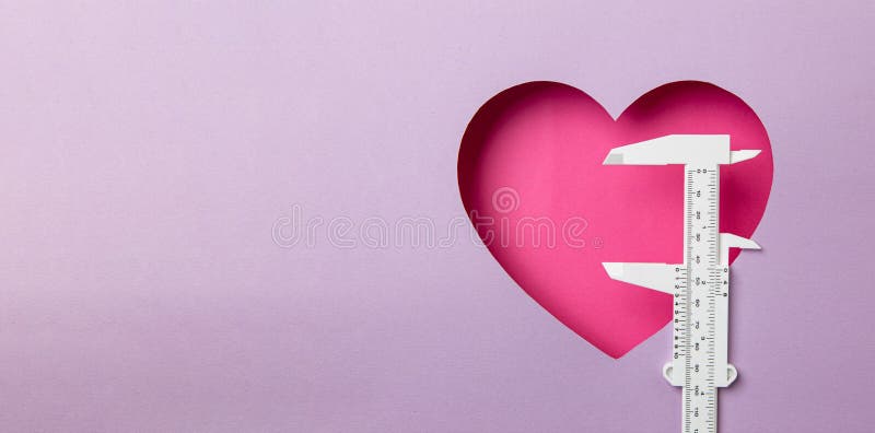 Pink Heart on a Purple Background. at the Heart is a White Micro Meter ...