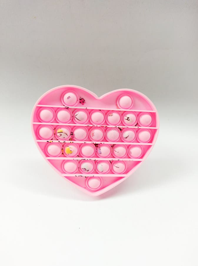 Pink Heart Shaped Pop it Toy Stock Photo - Image of shaped, heart ...