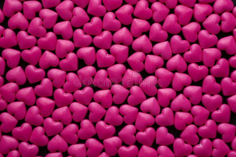 Pink Heart Sugar Sprinkles on Dark Texture Stock Image - Image of sugar ...
