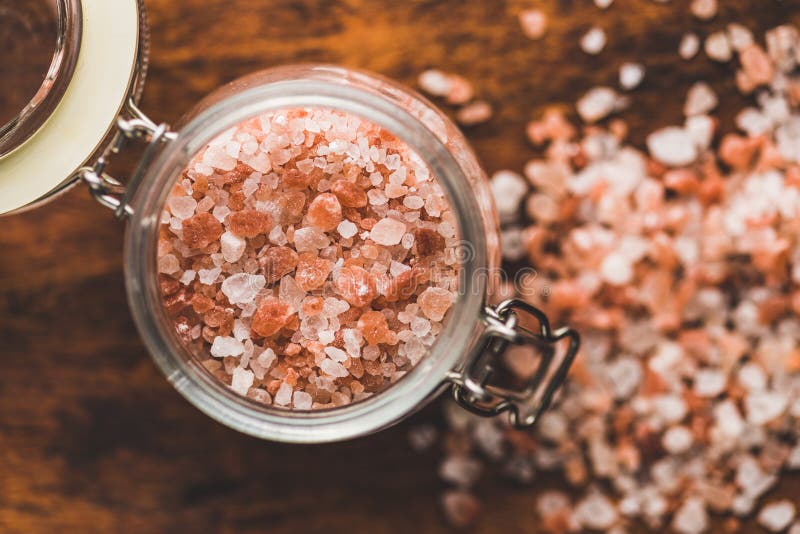 Pink Himalayan Salt in Jar on Wooden Table. Top View Stock Photo ...