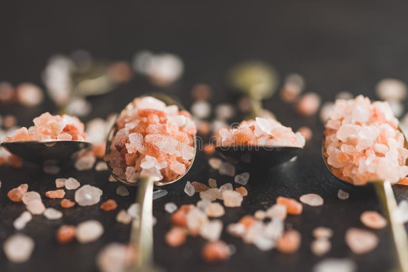 Pink Himalayan Salt in Spoon on Black Table Stock Image - Image of ...