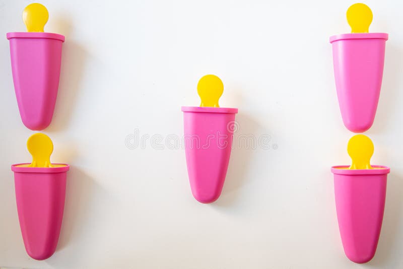 Pink Ice Cream Tins with Yellow Caps Stock Image - Image of tasty ...