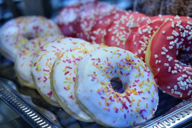 Pink iced donuts stock image. Image of decorative, concept - 73047231