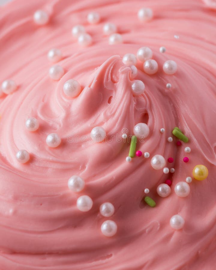 Pink Icing Frosting with Small Pearl Sprinkles Close Up Texture Stock ...