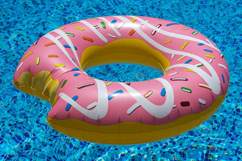 Pink Inflatable Donut Doughnut Floating Mattress in Swimming Pool ... Pink Inflatable Donut Doughnut Floating Mattress in Swimming Pool ...