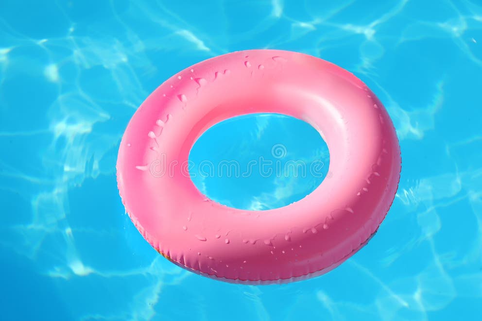 Pink Inflatable Ring in Swimming Pool Outdoors Stock Image - Image of ...