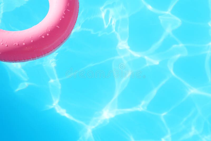 Pink Inflatable Ring in Swimming Pool Outdoors Stock Image - Image of ...