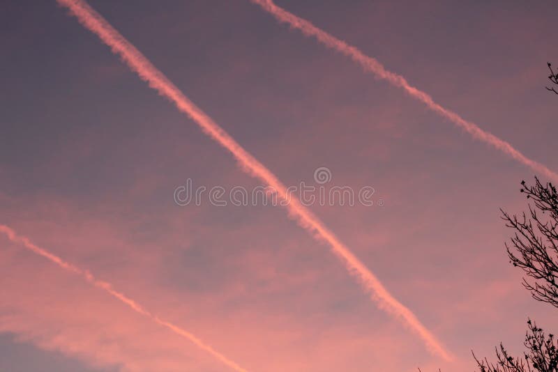 Dramatic Evening Sky with Jet Trails Stock Photo - Image of sunset ...