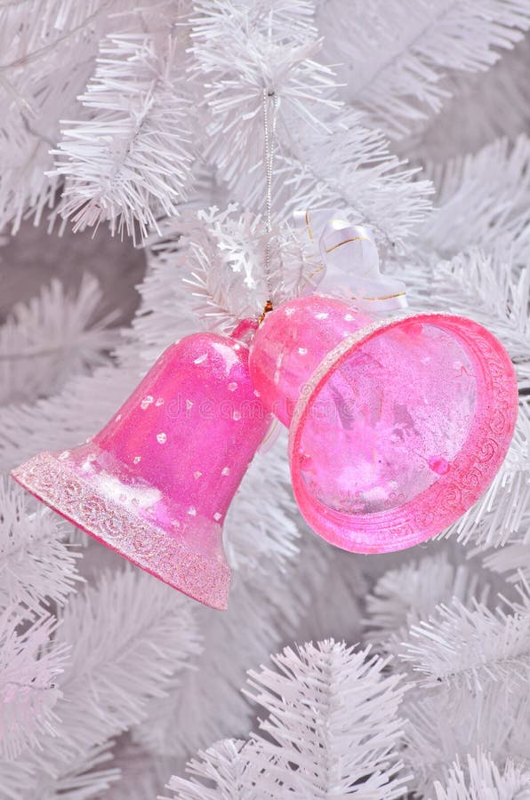 Pink Jingle Bell on Christmas Tree Stock Image - Image of decor ...