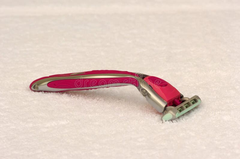 Pink Lady Shaver on a Towel Stock Photo - Image of lady, blade: 2797070