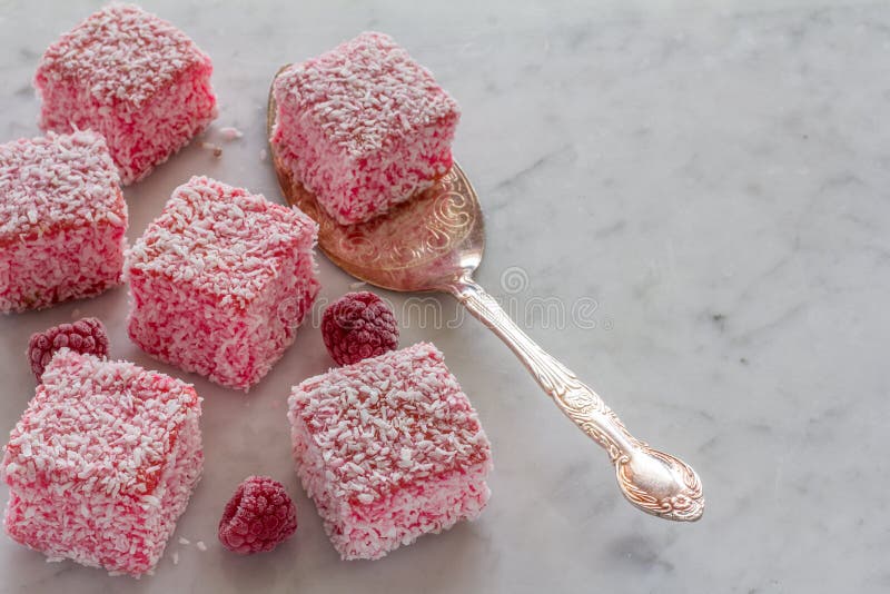 Pink Lamingtons with Raspberries on Marble Stock Image - Image of ...